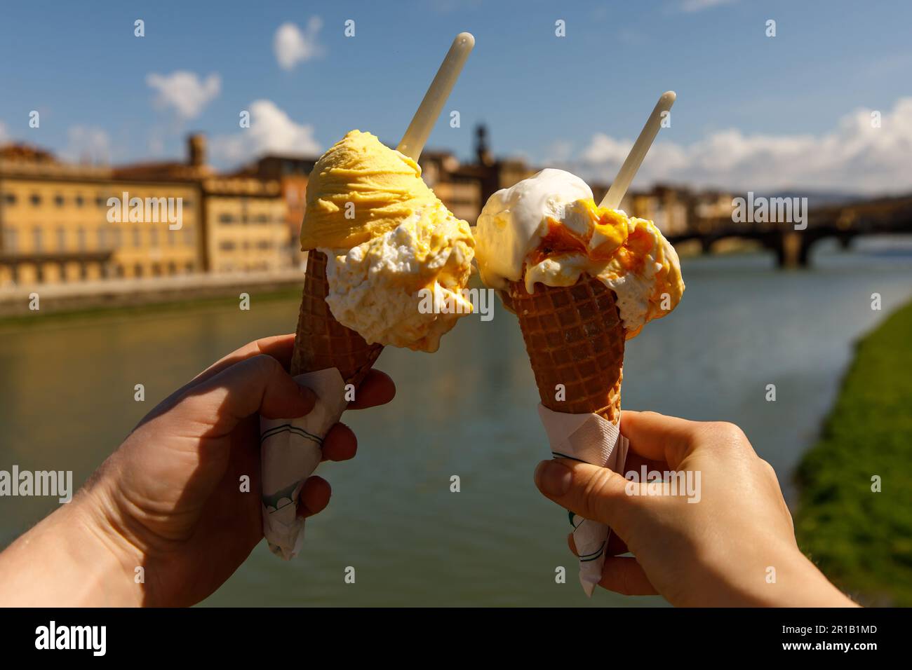 Italian gelato in the couple hands Stock Photo - Alamy