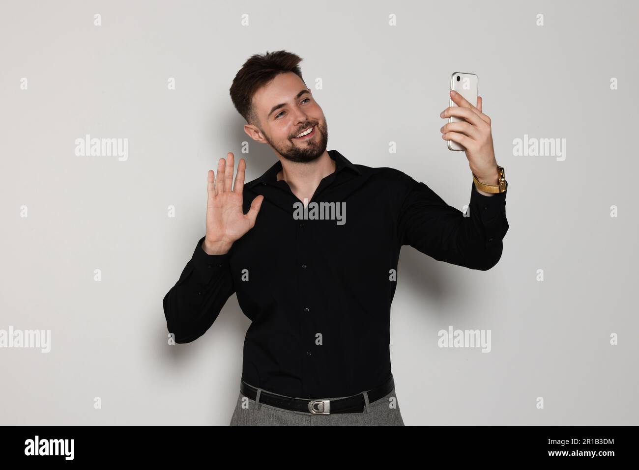 Man vlogger in grey shirt hi-res stock photography and images - Alamy