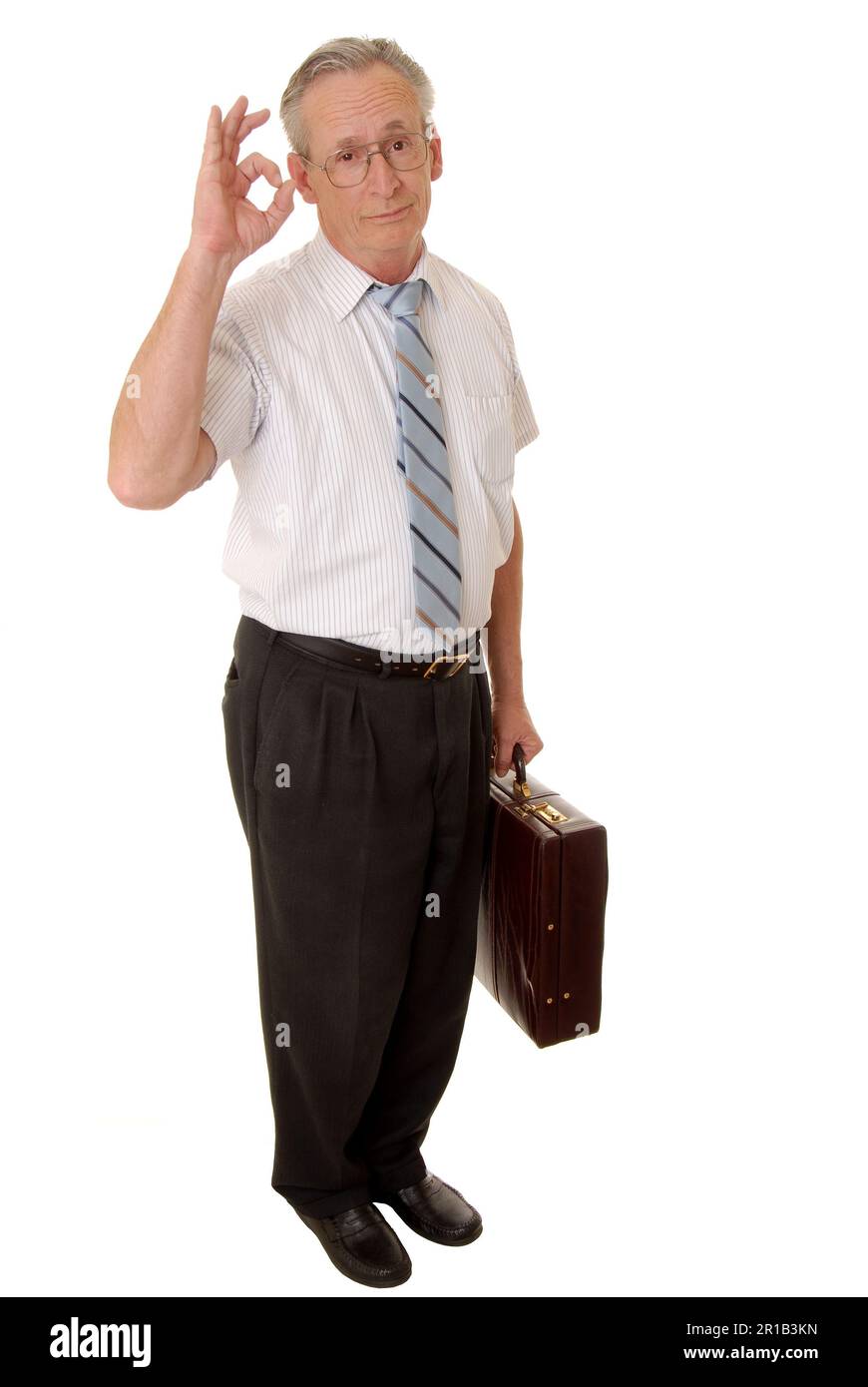 Senior businessman with a rather interesting expression Stock Photo - Alamy