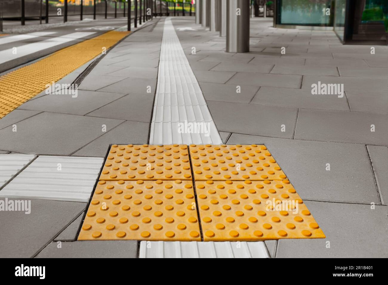 Tiles with tactile ground surface indicators, closeup view Stock Photo ...