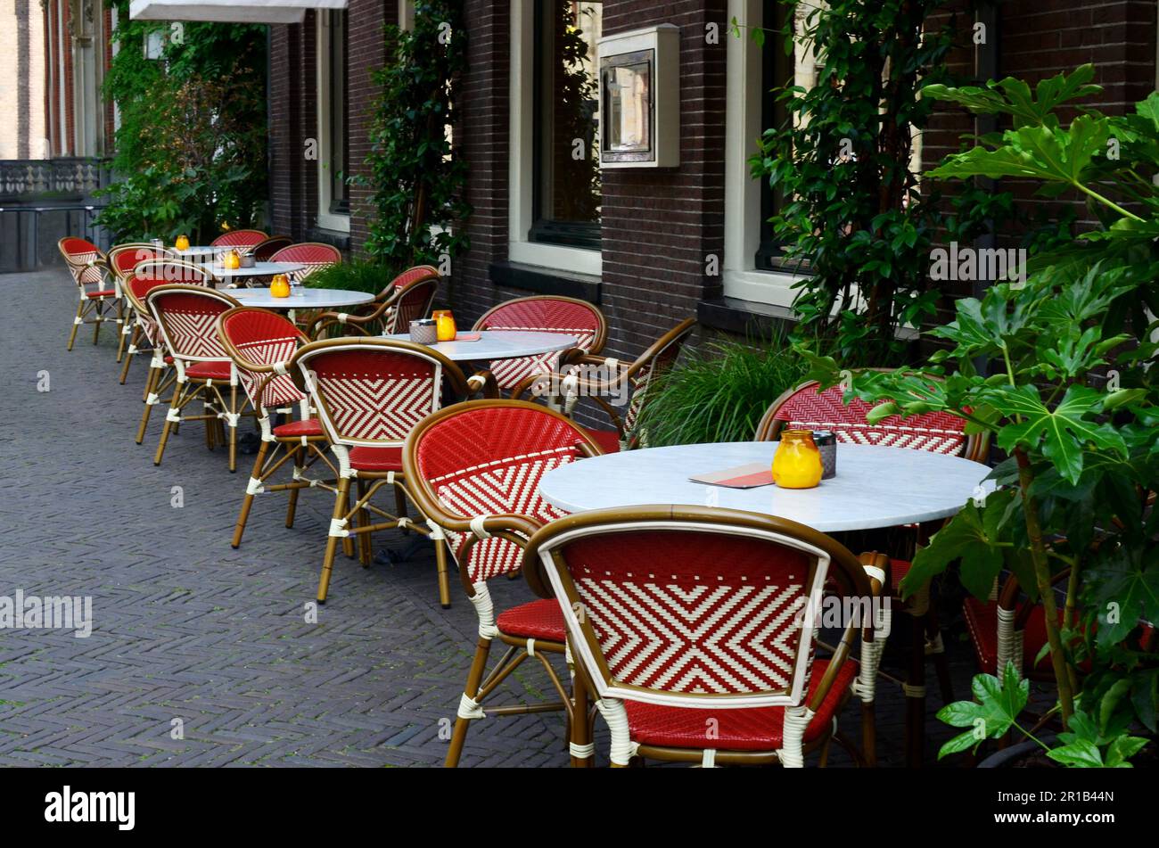 Beautiful view of outdoor cafe with stylish furniture Stock Photo - Alamy