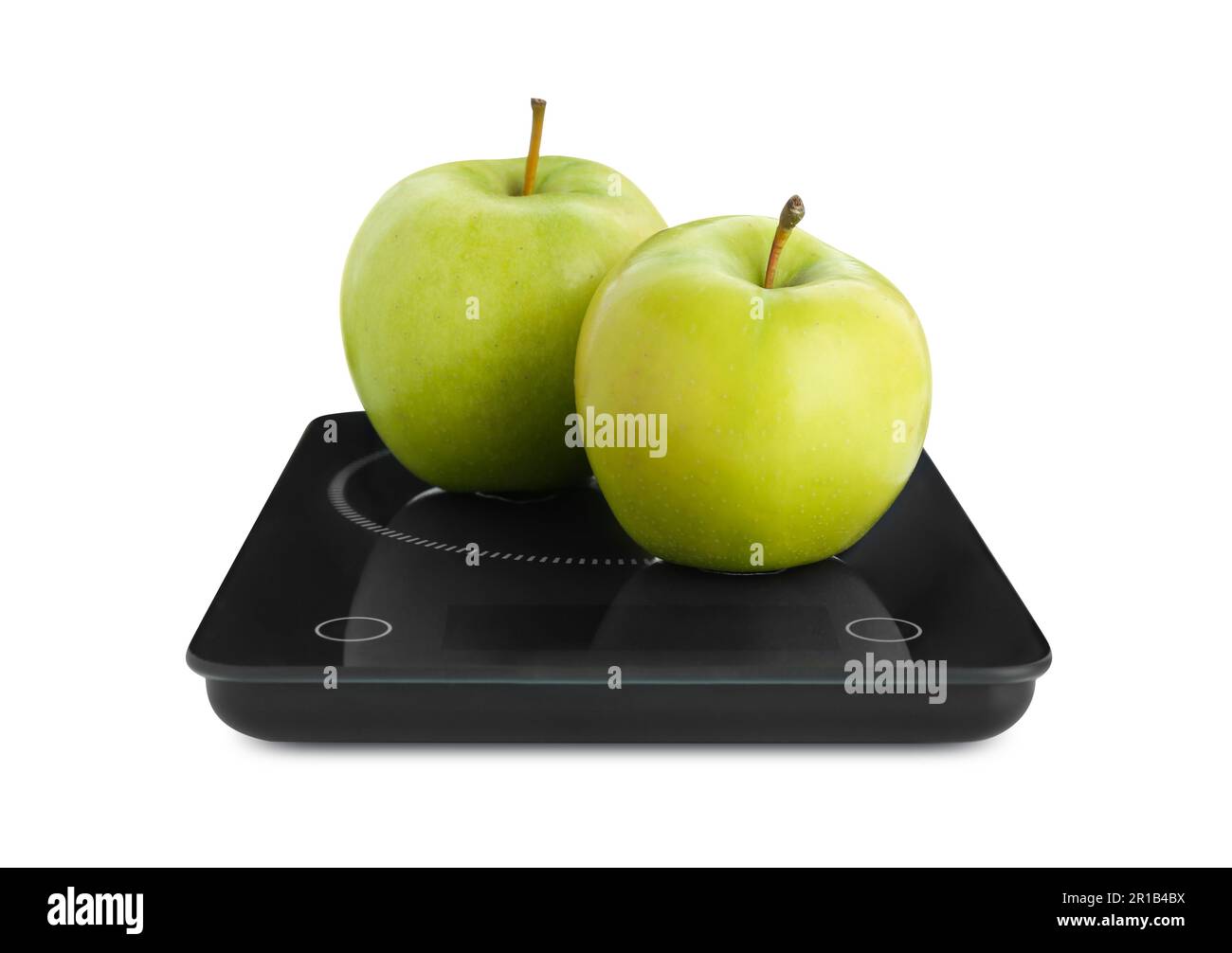 Electronic scales with ripe green apples on white background Stock ...