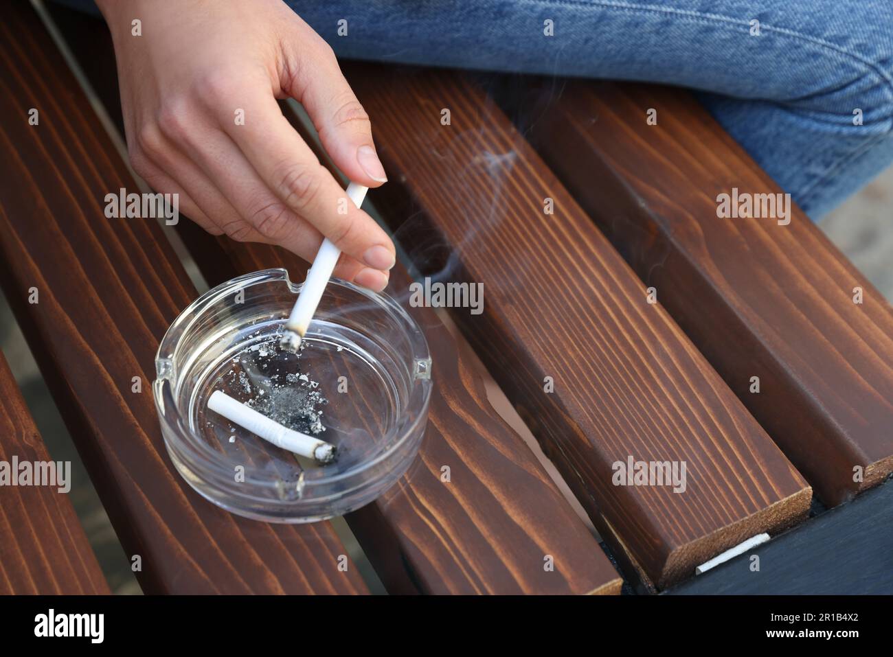 Ashtray on bench hi-res stock photography and images - Alamy