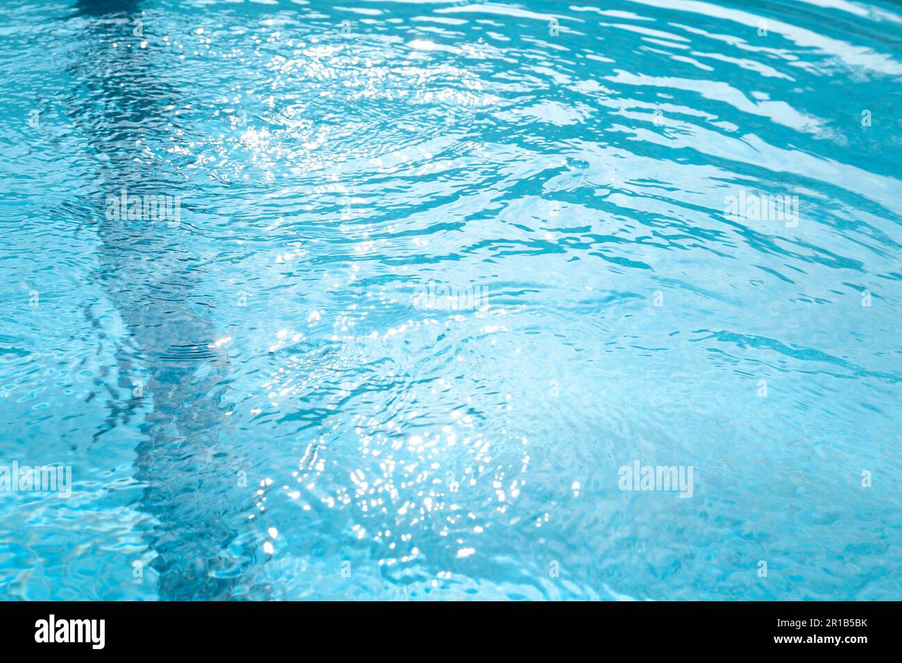 Outdoor swimming pool with clear rippled water Stock Photo - Alamy
