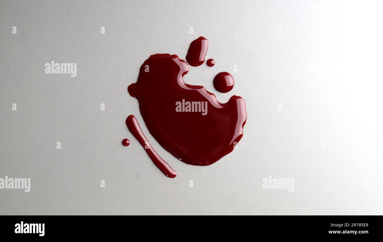 Stain and drops of blood on grey background, top view Stock Photo - Alamy