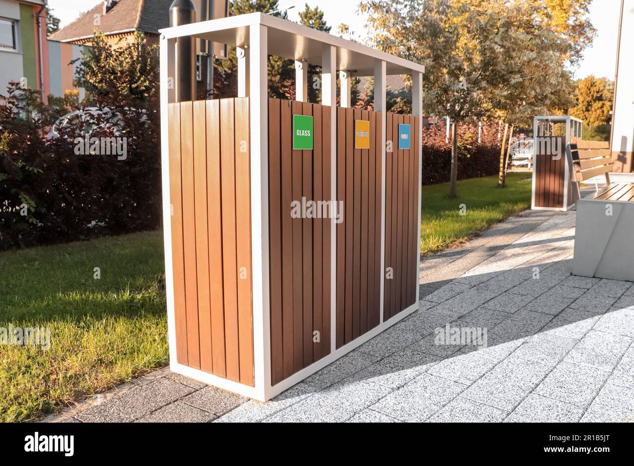 Different sorting bins for waste recycling on sunny day outdoors Stock ...