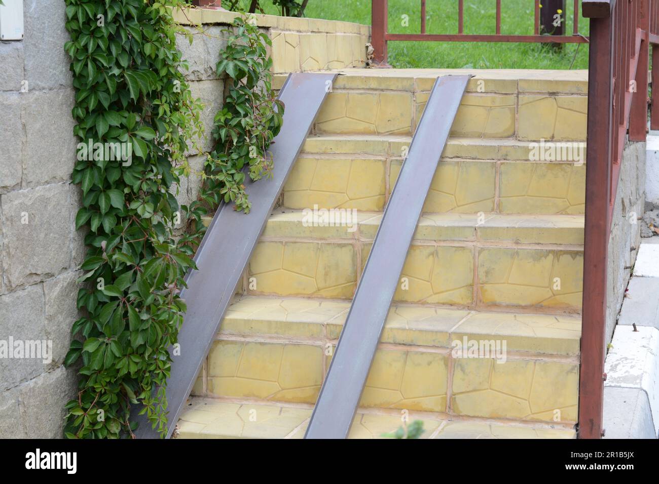 View of stone stairs with ramp outdoors Stock Photo - Alamy