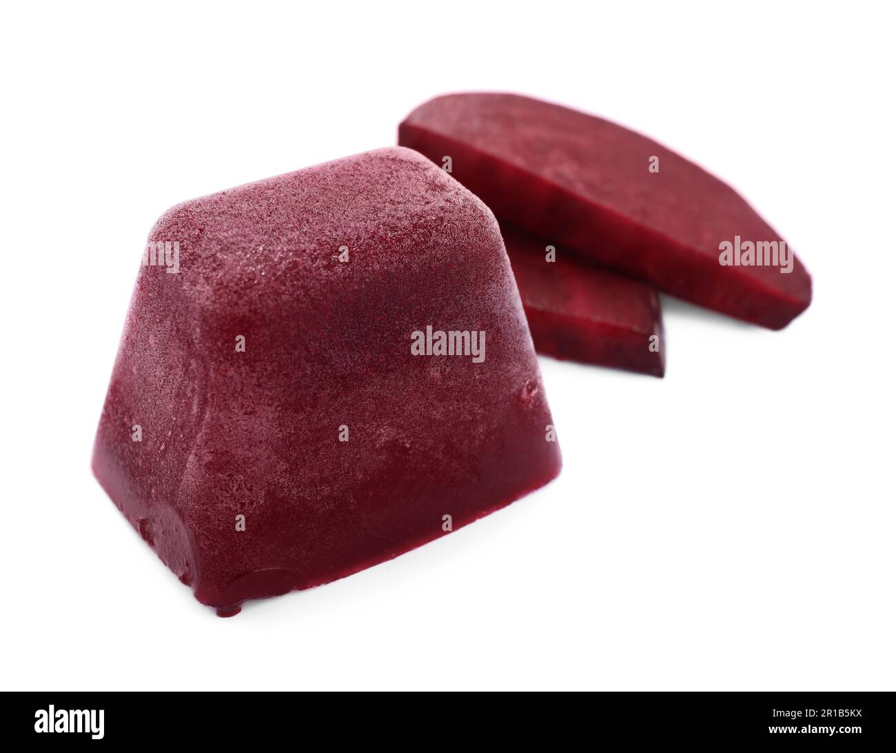 Frozen beetroot puree cube and fresh beetroot isolated on white Stock ...