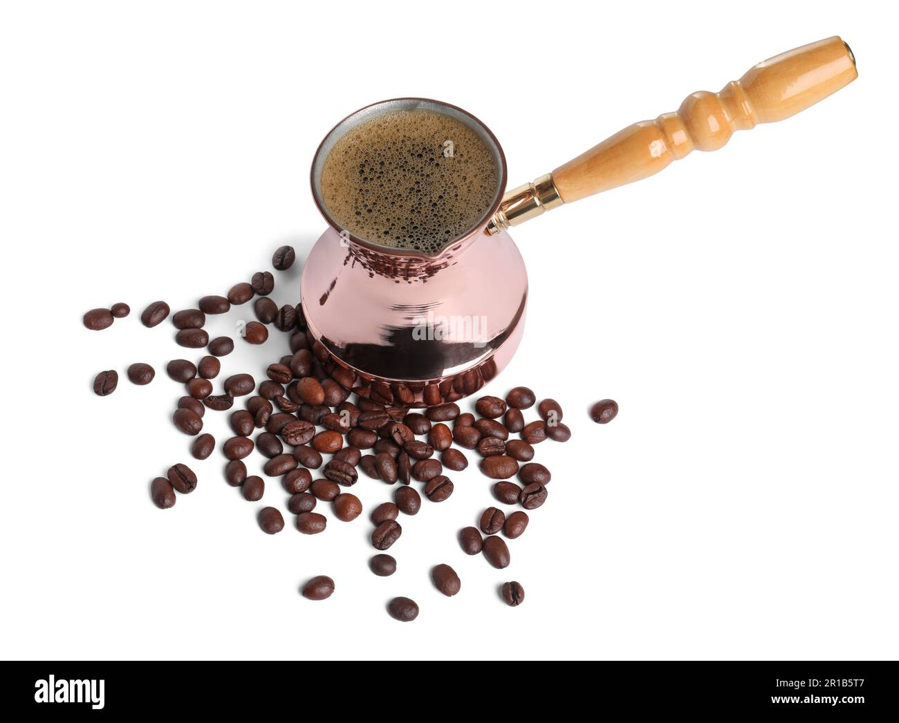 Turkish coffee. Cezve with hot coffee and beans on white background ...