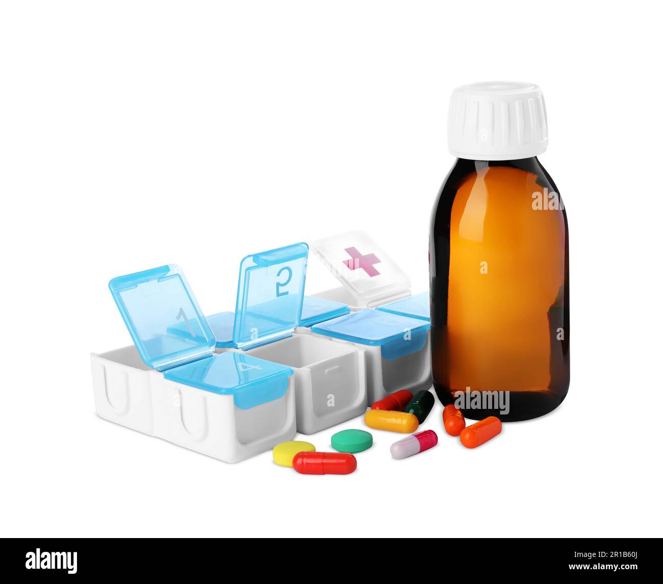 Bottle of syrup with pills on white background. Cough and cold medicine ...
