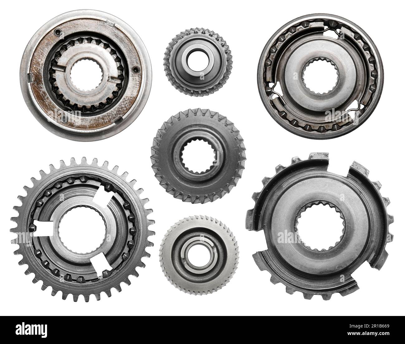 Set with different stainless steel gears on white background, top view ...