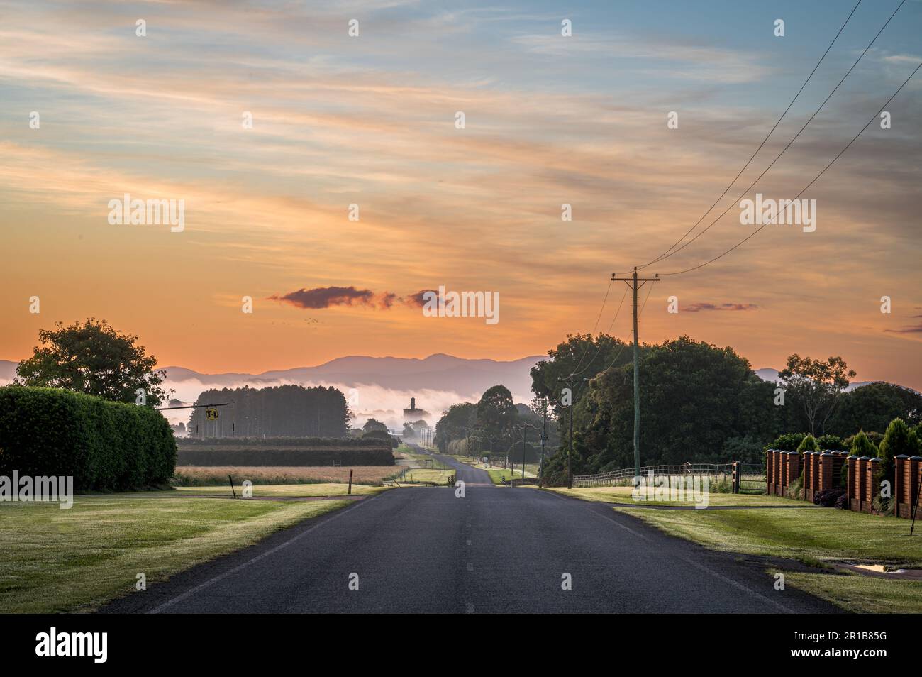 A stunning sunrise with a cloud inversion looking down a winding ...