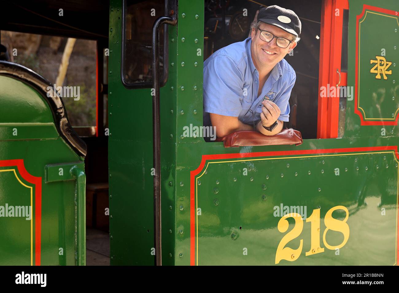 Driver Lee Wiggins poses for a photo during the reopening of the ...