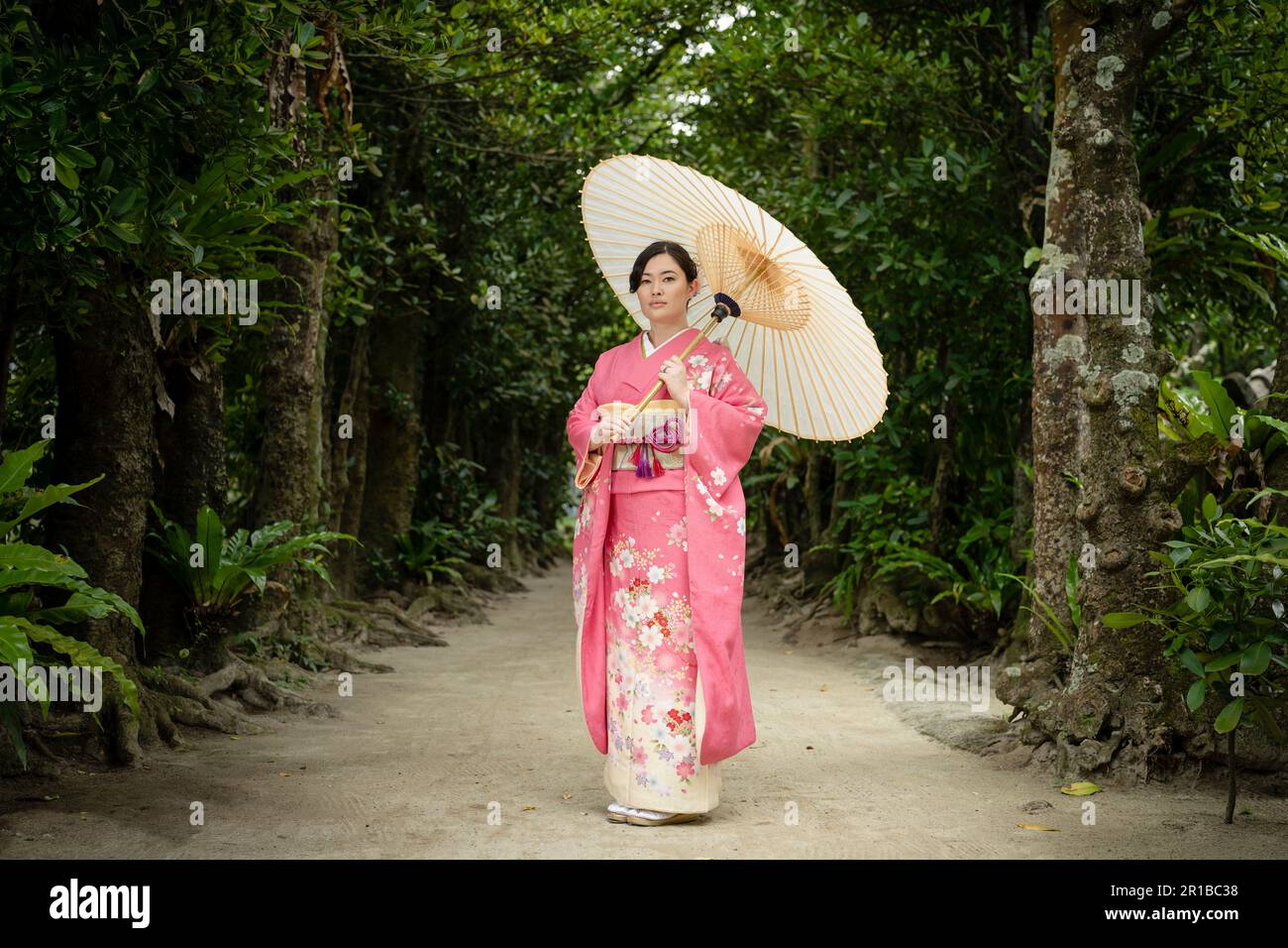 Beautiful young mixed race Japanese / American woman wearing a kimono ...
