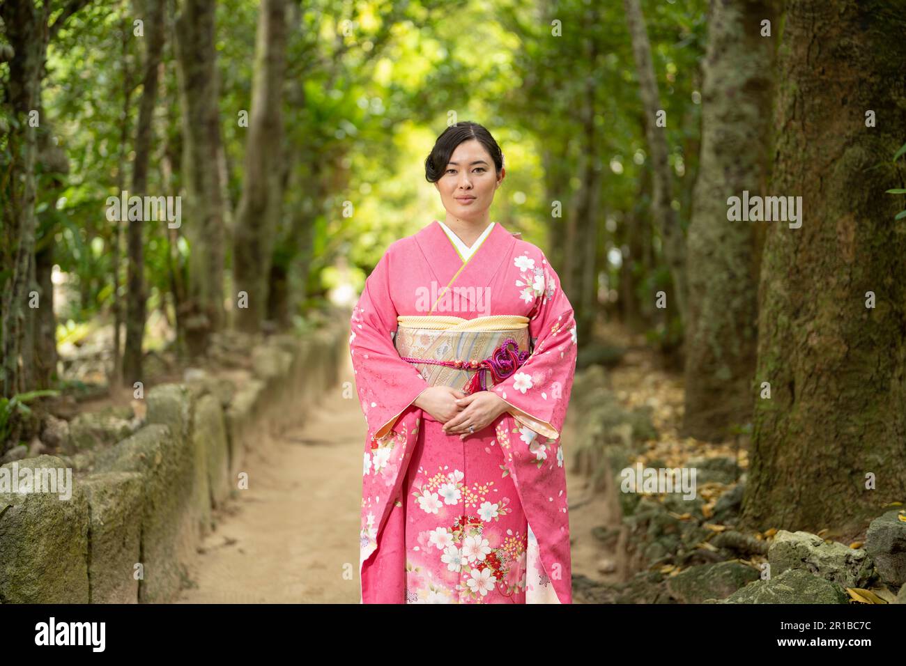 Beautiful young mixed race Japanese / American woman wearing a kimono ...
