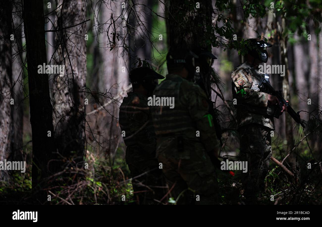 Airmen assigned to the 628th Civil Engineer Squadron (CES) stand on ...