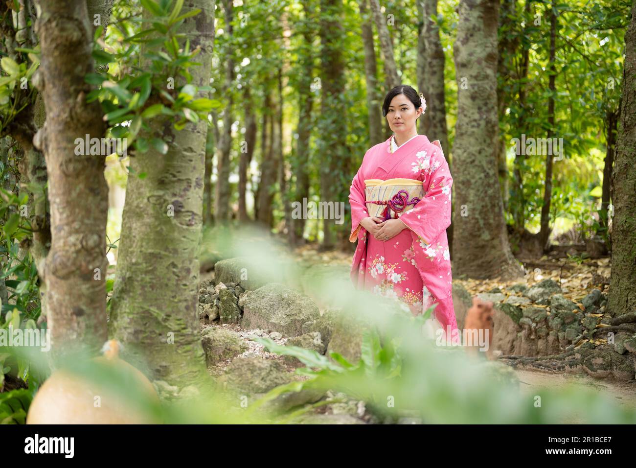 Beautiful young mixed race Japanese / American woman wearing a kimono ...