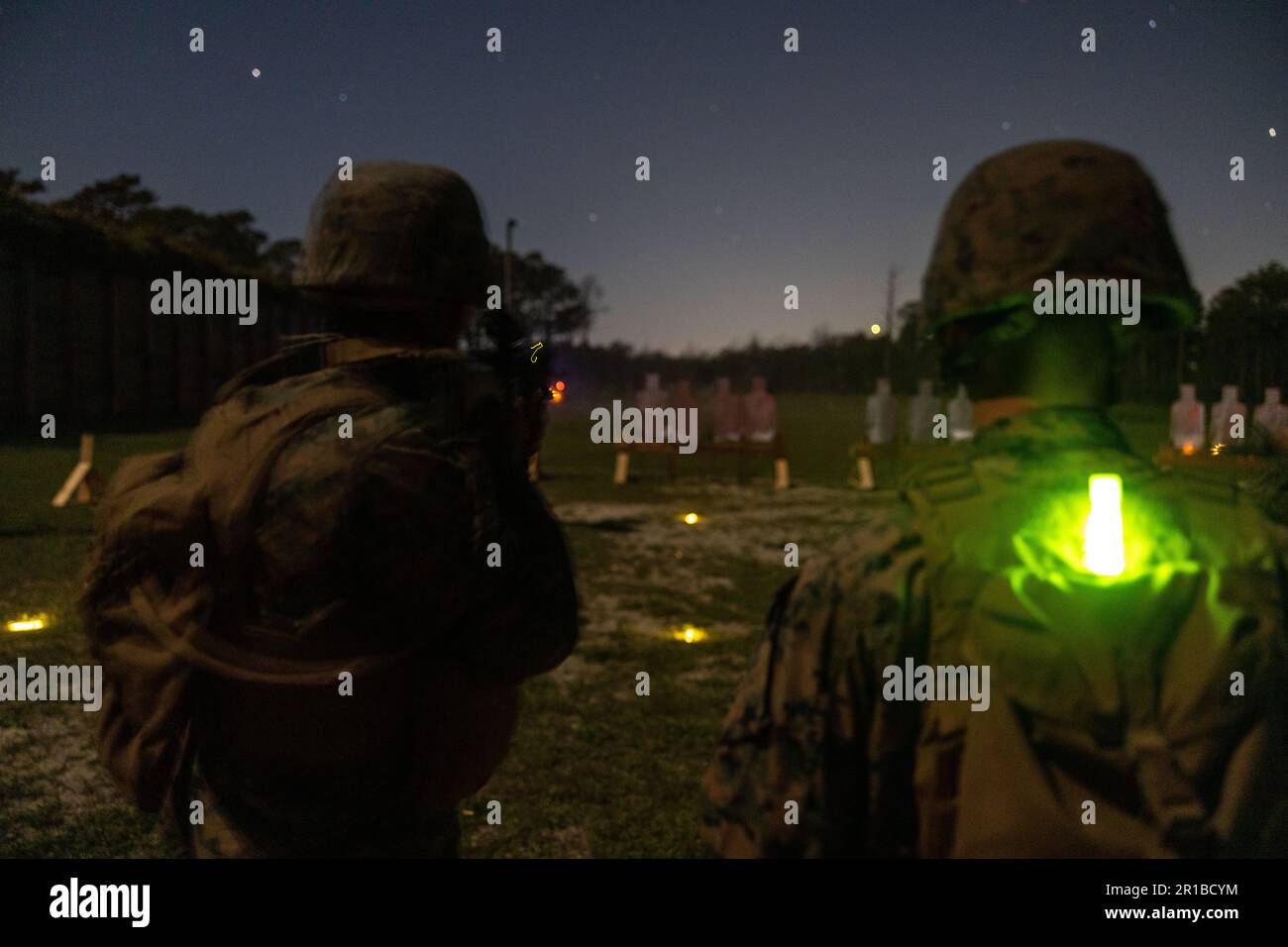 U.S. Marines with Marine Wing Support Squadron (MWSS) 271 shoot during ...