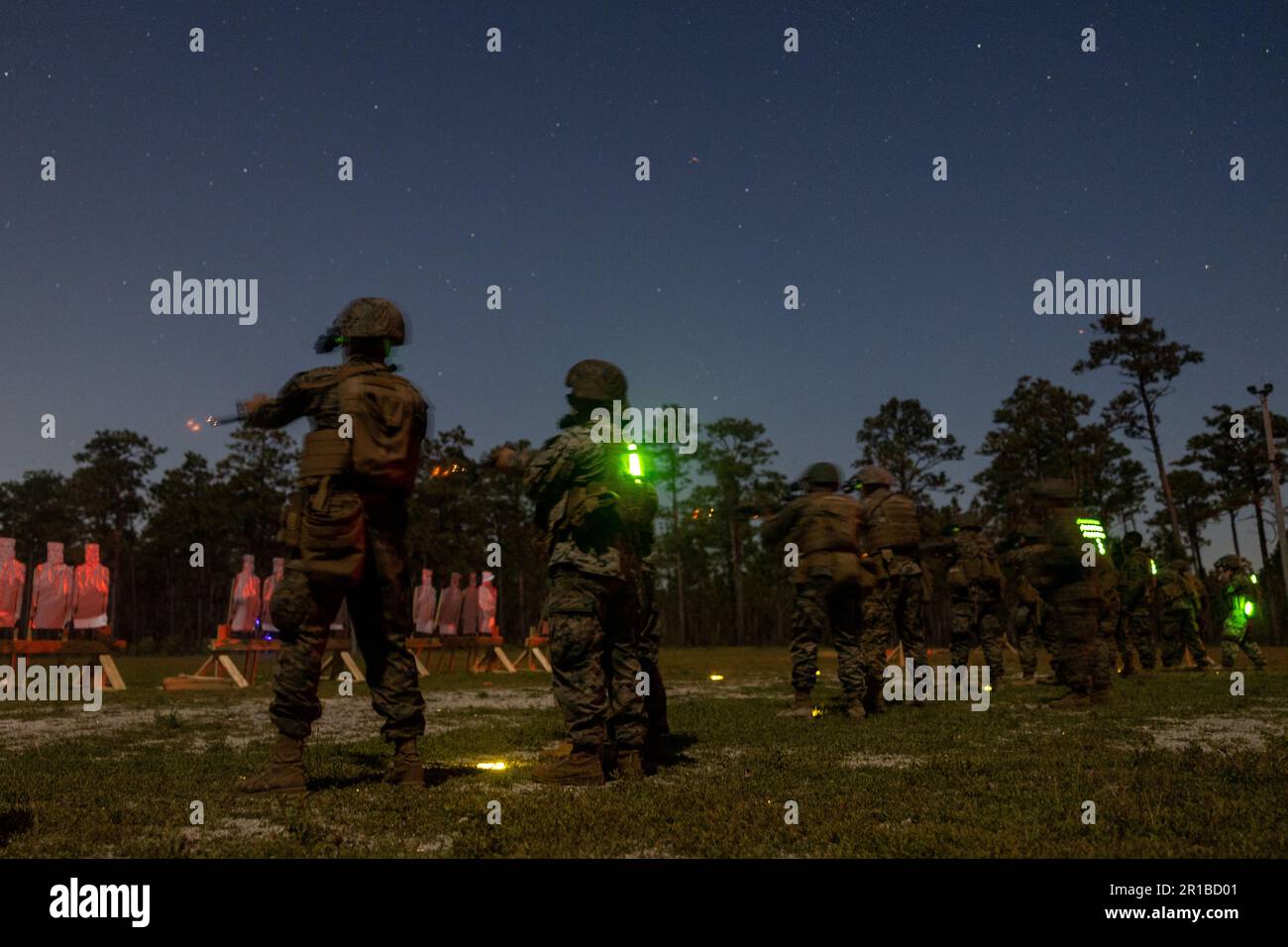U.S. Marines with Marine Wing Support Squadron (MWSS) 271 shoot during ...