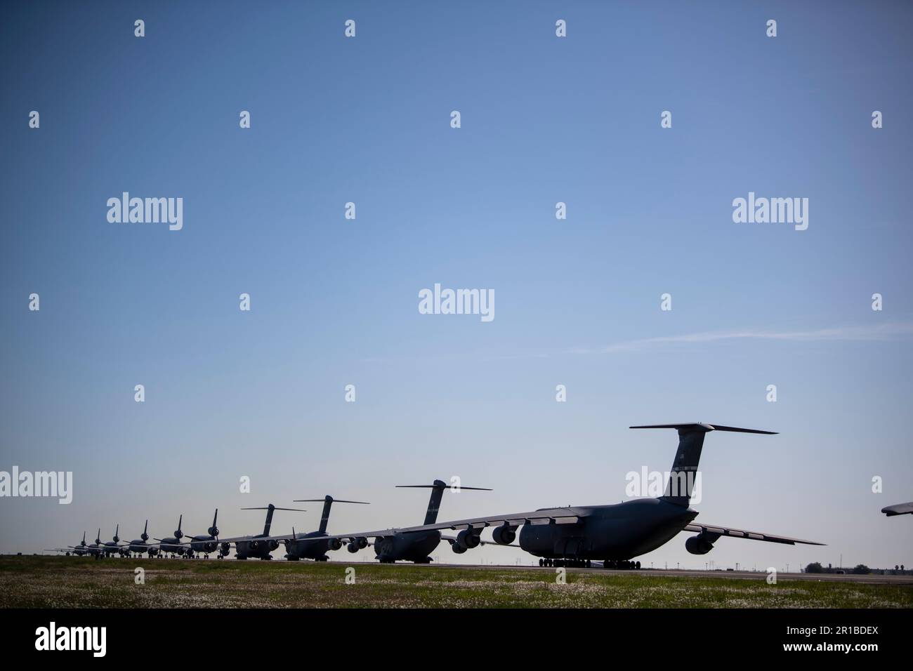 A formation of aircraft line the runway as part of a maximum generation ...