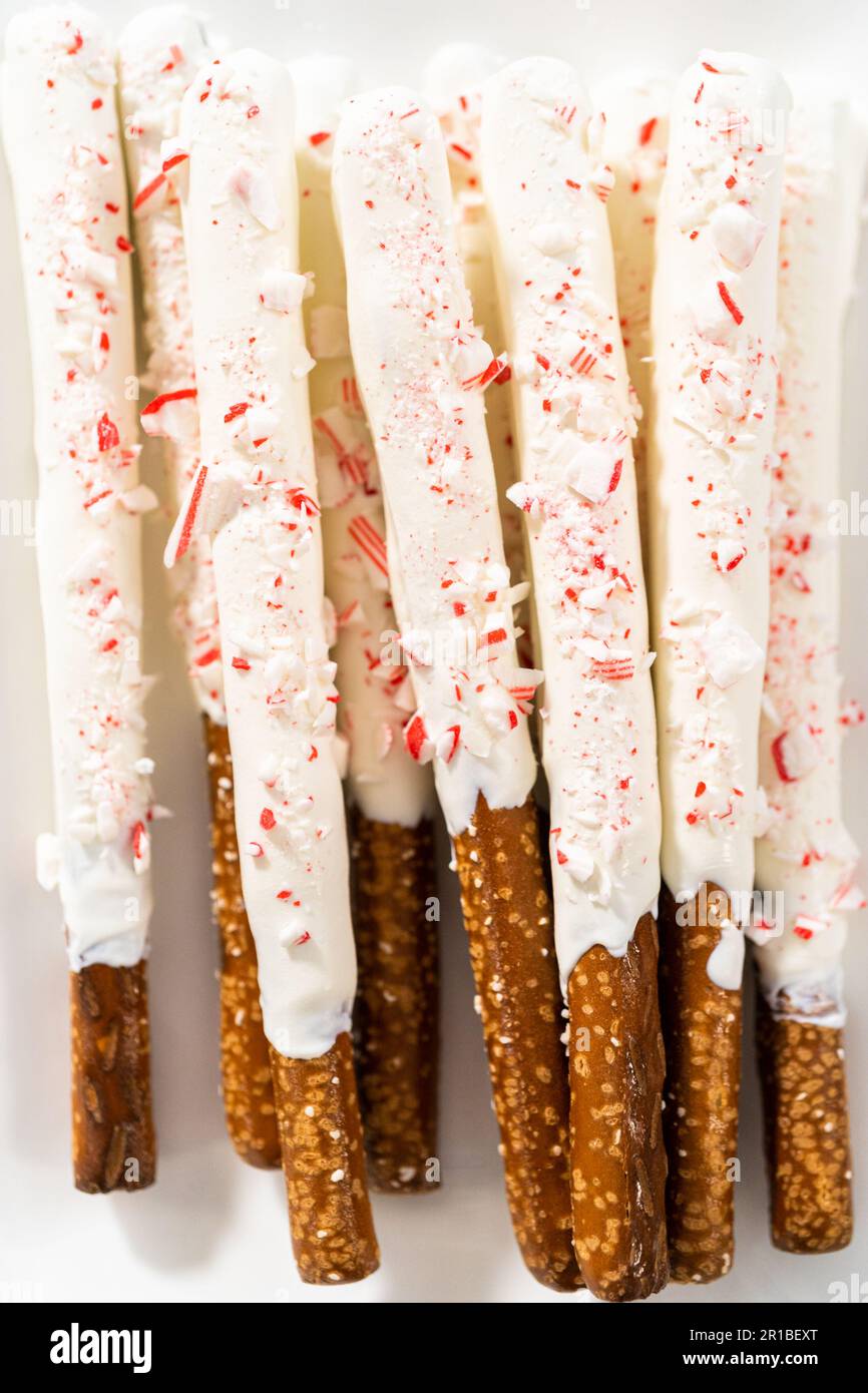 Candy cane chocolate covered pretzel rods Stock Photo - Alamy