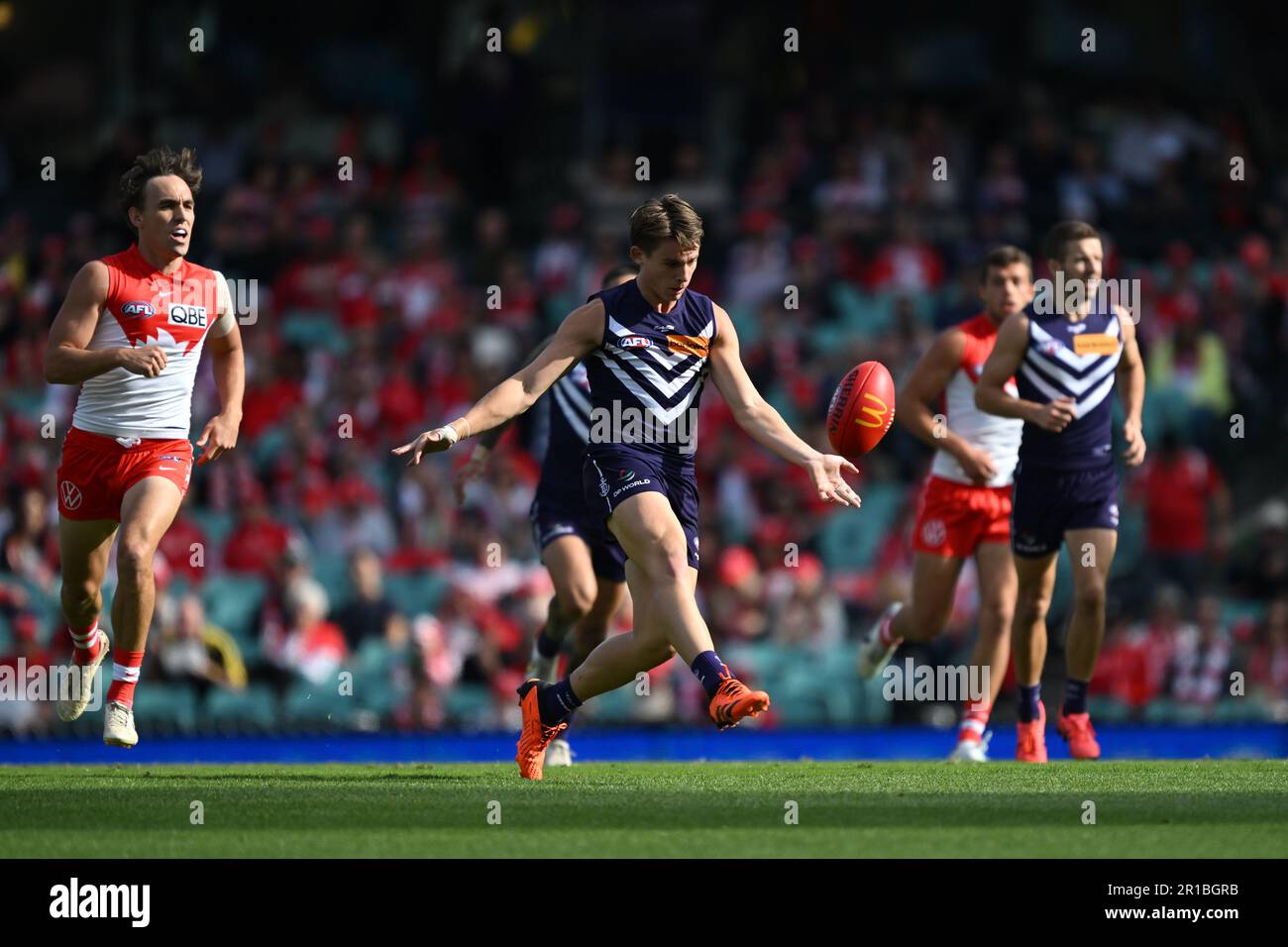 Caleb Serong of the Dockers kicks during the AFL Round 9 match between ...
