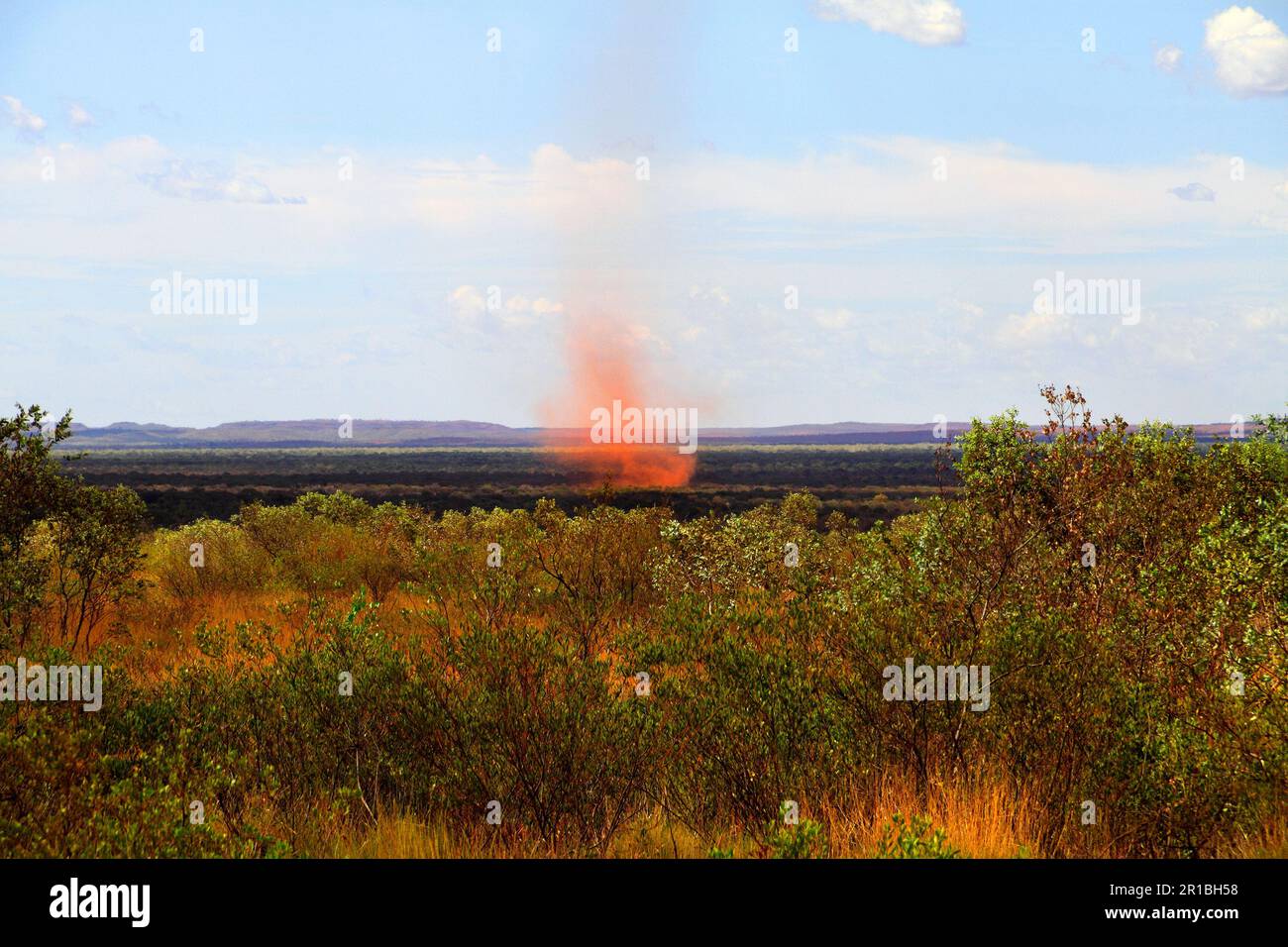 Red dust devil or whirlwind in outback landscape, Pilbara, Northwest ...