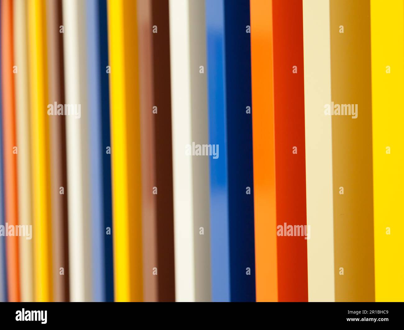 Several colors in prospective painted on wood columns Stock Photo - Alamy