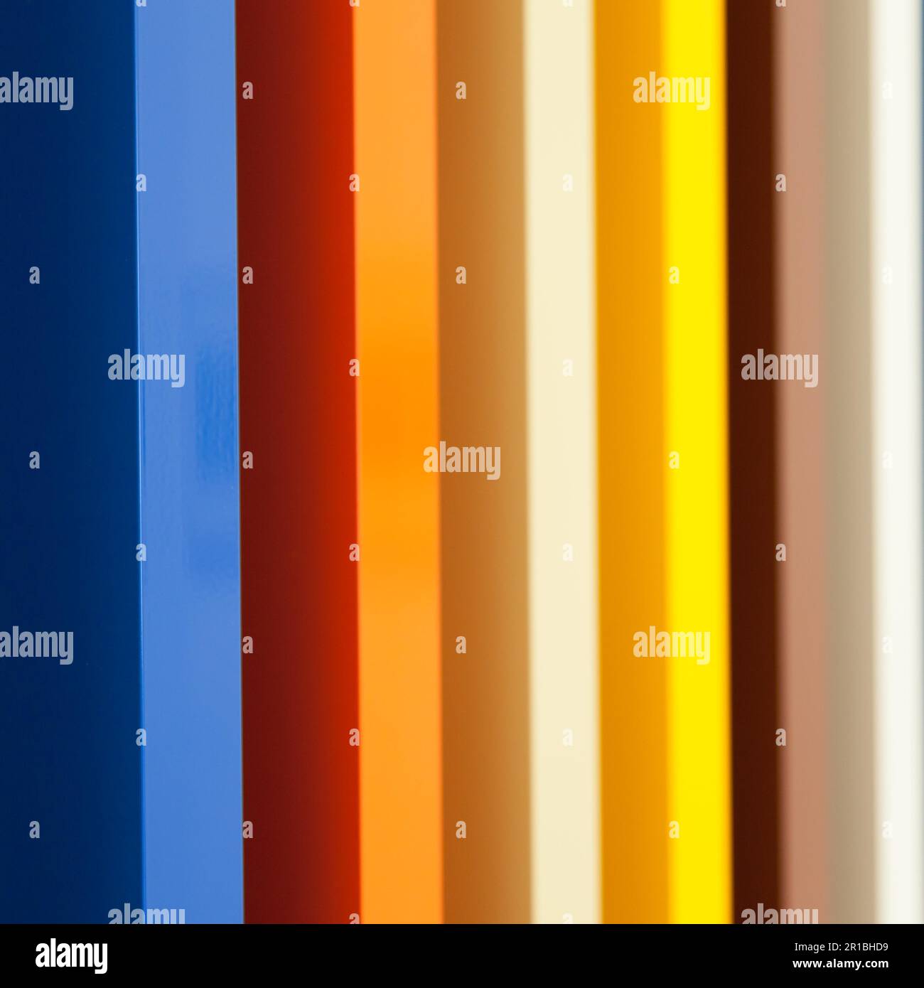 Several colors in prospective painted on wood columns Stock Photo - Alamy