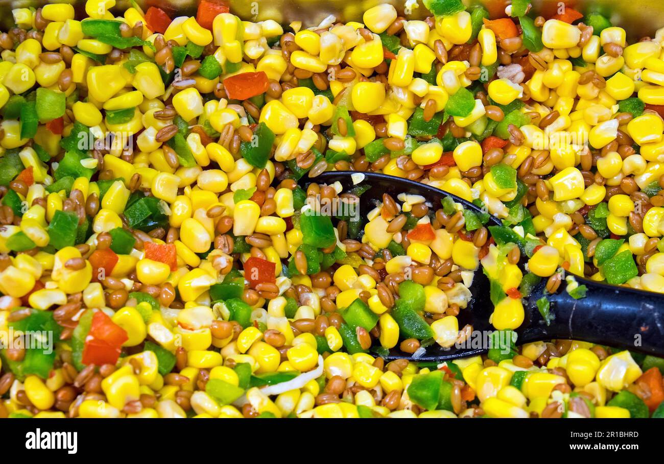 Corn and pepper salad on a buffet Stock Photo - Alamy