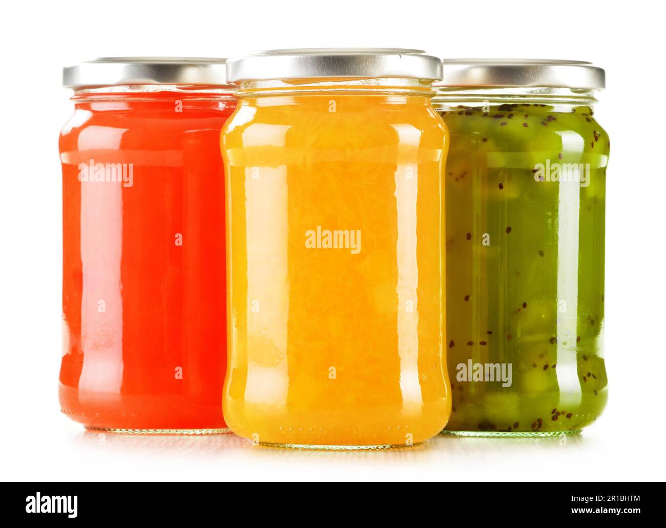 Jars of fruity jams isolated on white background. Preserved fruits ...