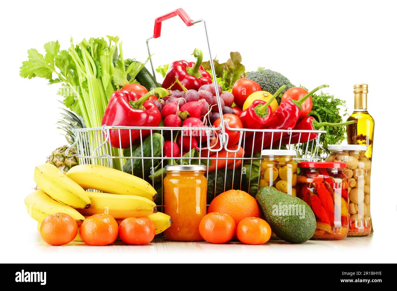 Wire shopping basket with groceries isolated on white background Stock ...