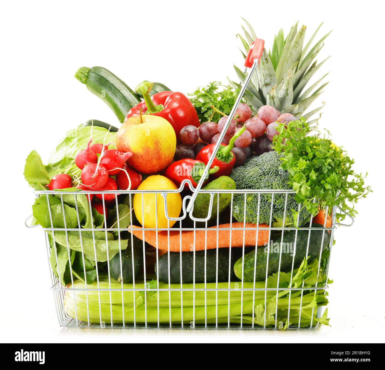 Wire shopping basket with groceries isolated on white background Stock ...