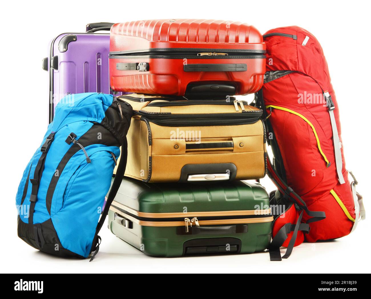 Luggage consisting of large suitcases and rucksacks isolated on white ...