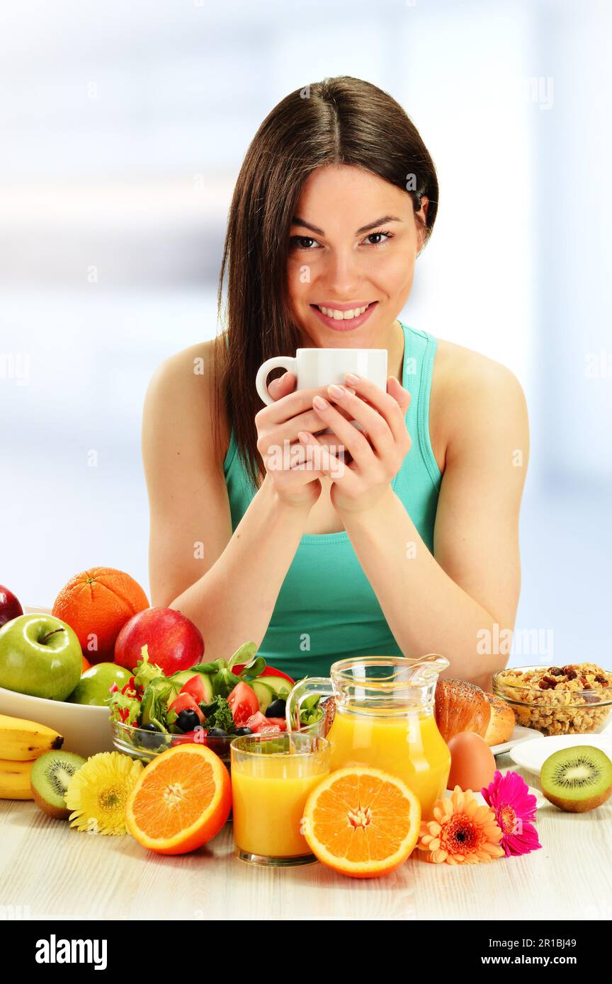 Young woman having breakfast. Balanced diet Stock Photo - Alamy