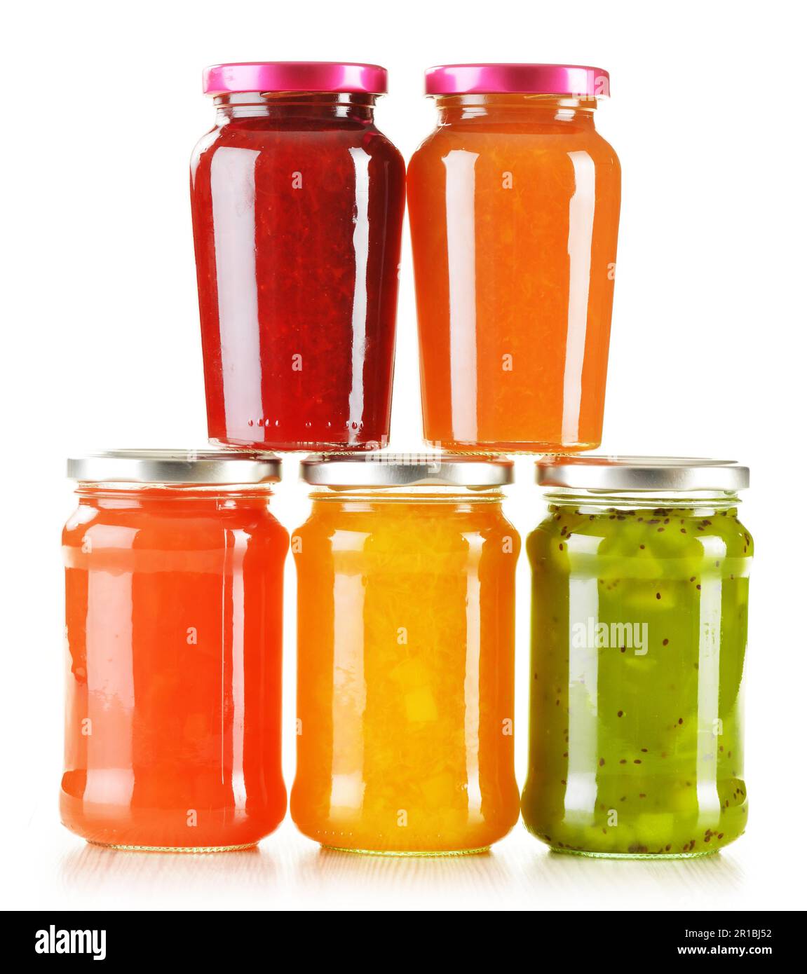 Jars of fruity jams isolated on white background. Preserved fruits ...