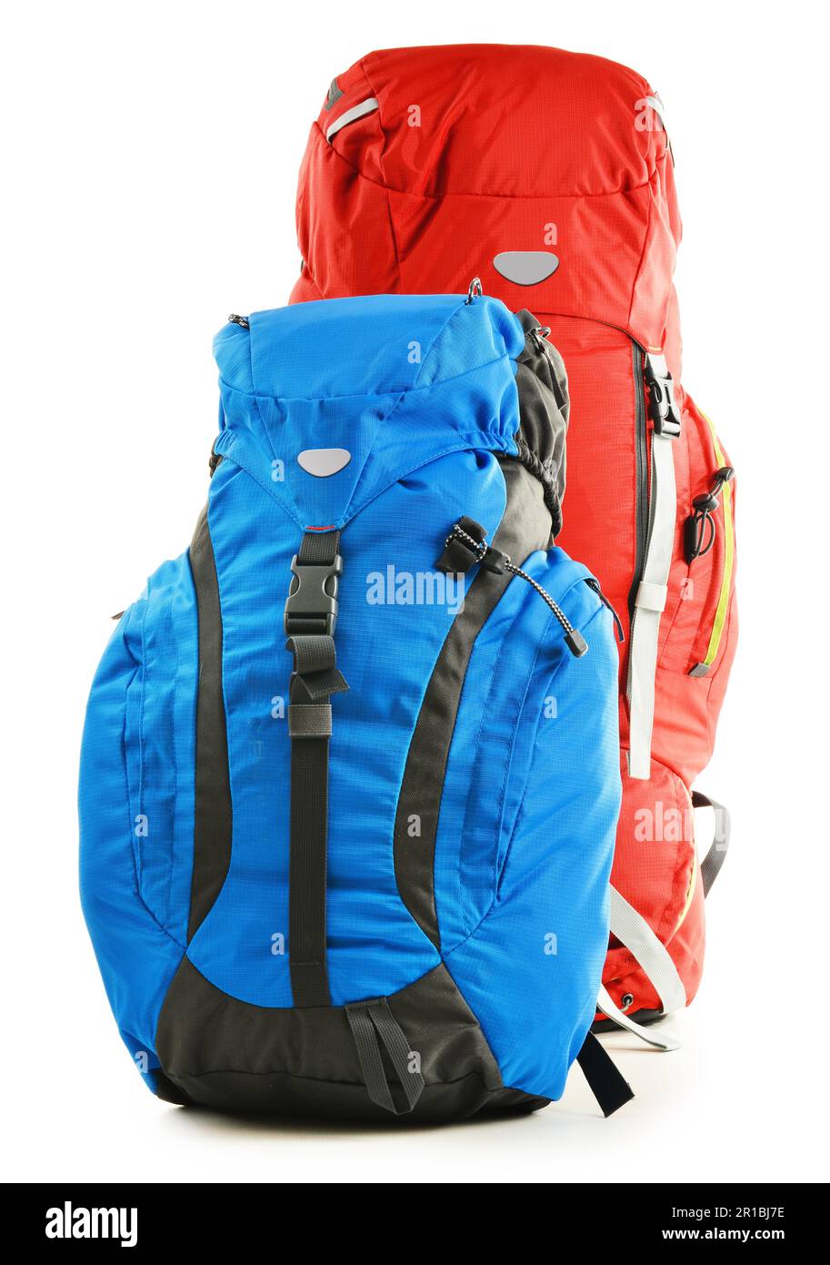 Two touristic backpacks isolated on white background Stock Photo - Alamy