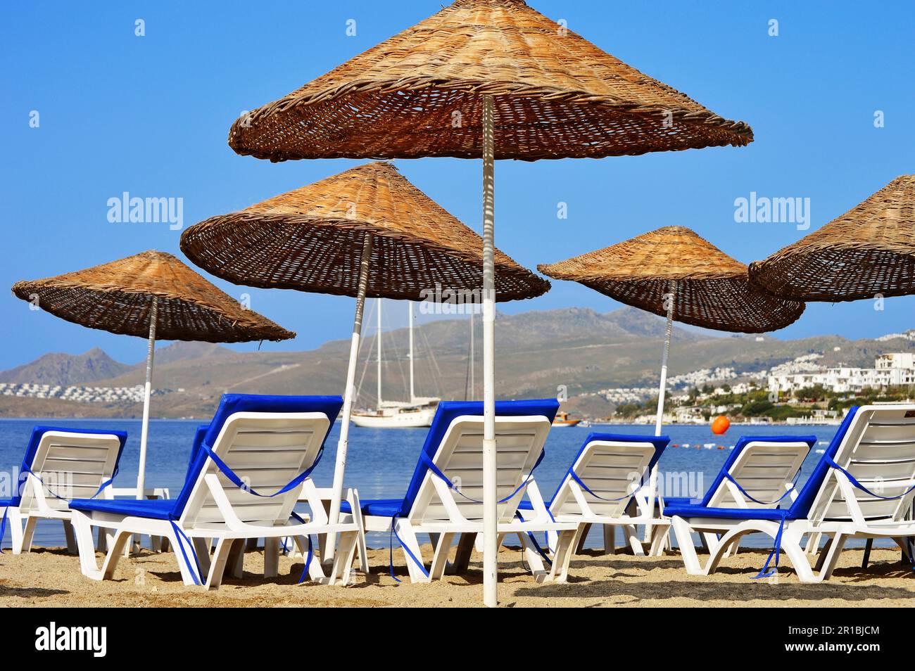 Mediterranean beach during hot summer day Stock Photo - Alamy