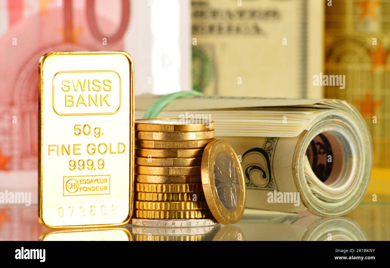 Composition with 50 gram gold bar, banknotes and coins Stock Photo - Alamy