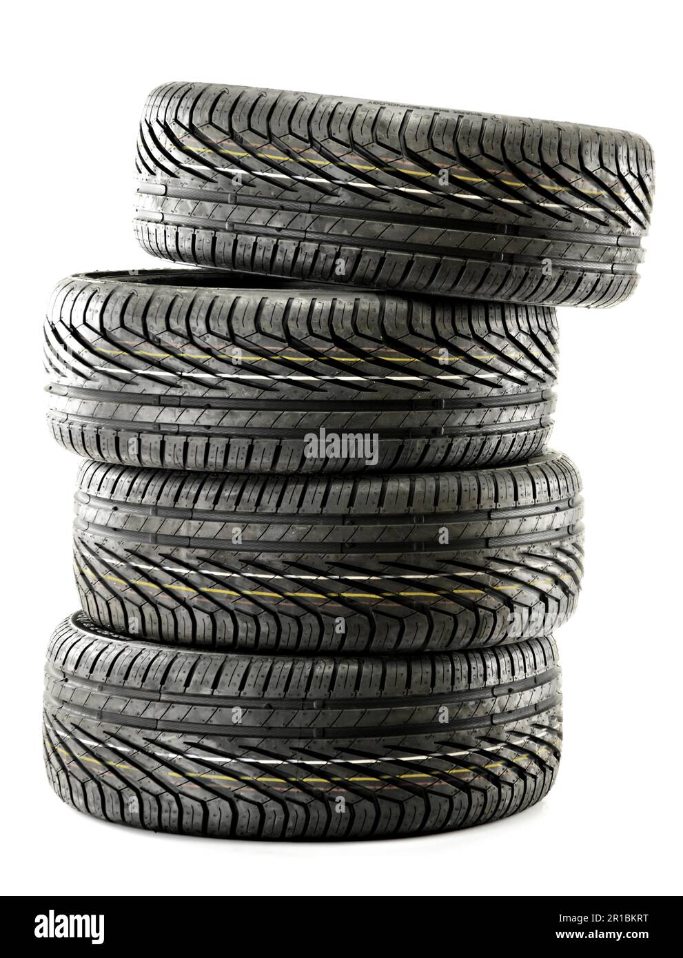 Four new black tires isolated on white background Stock Photo - Alamy