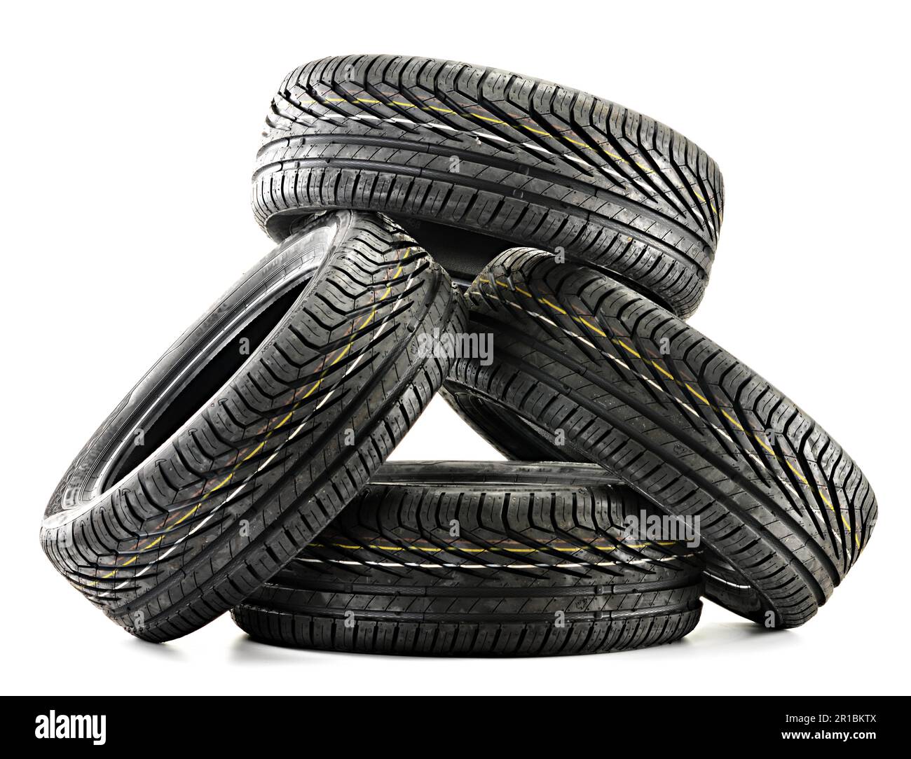 Four new black tires isolated on white background Stock Photo - Alamy
