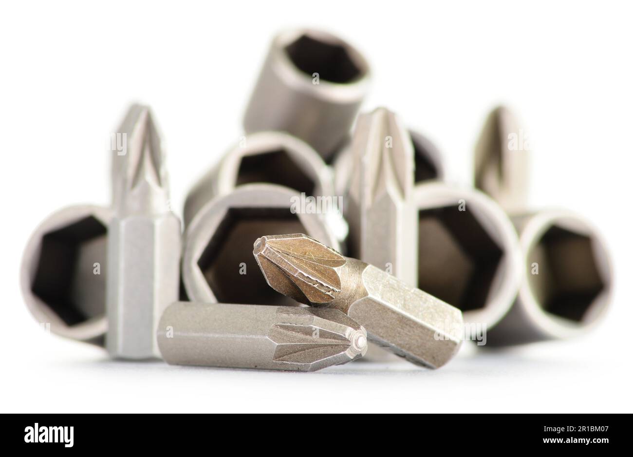 Composition with screwdriver heads of different size isolated on white ...