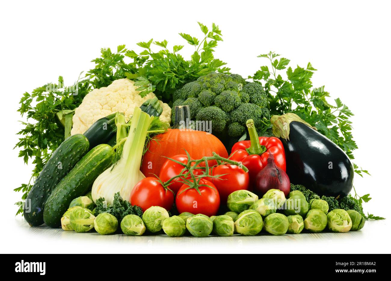 Composition with assorted raw organic vegetables isolated on white ...