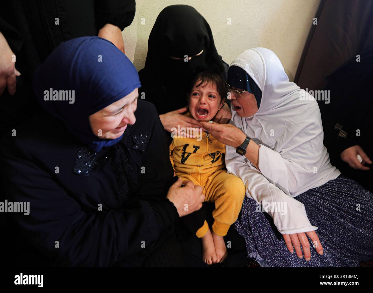 Gaza, Palestine. 11th May, 2023. Relatives of the two Palestinians, Ali ...