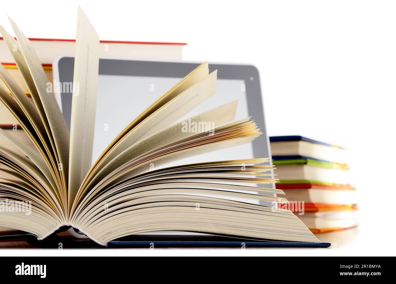 Composition with books and tablet computer isolated on white background ...