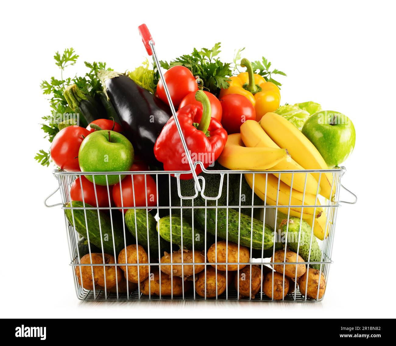 Different fruits in a basket Cut Out Stock Images & Pictures - Alamy