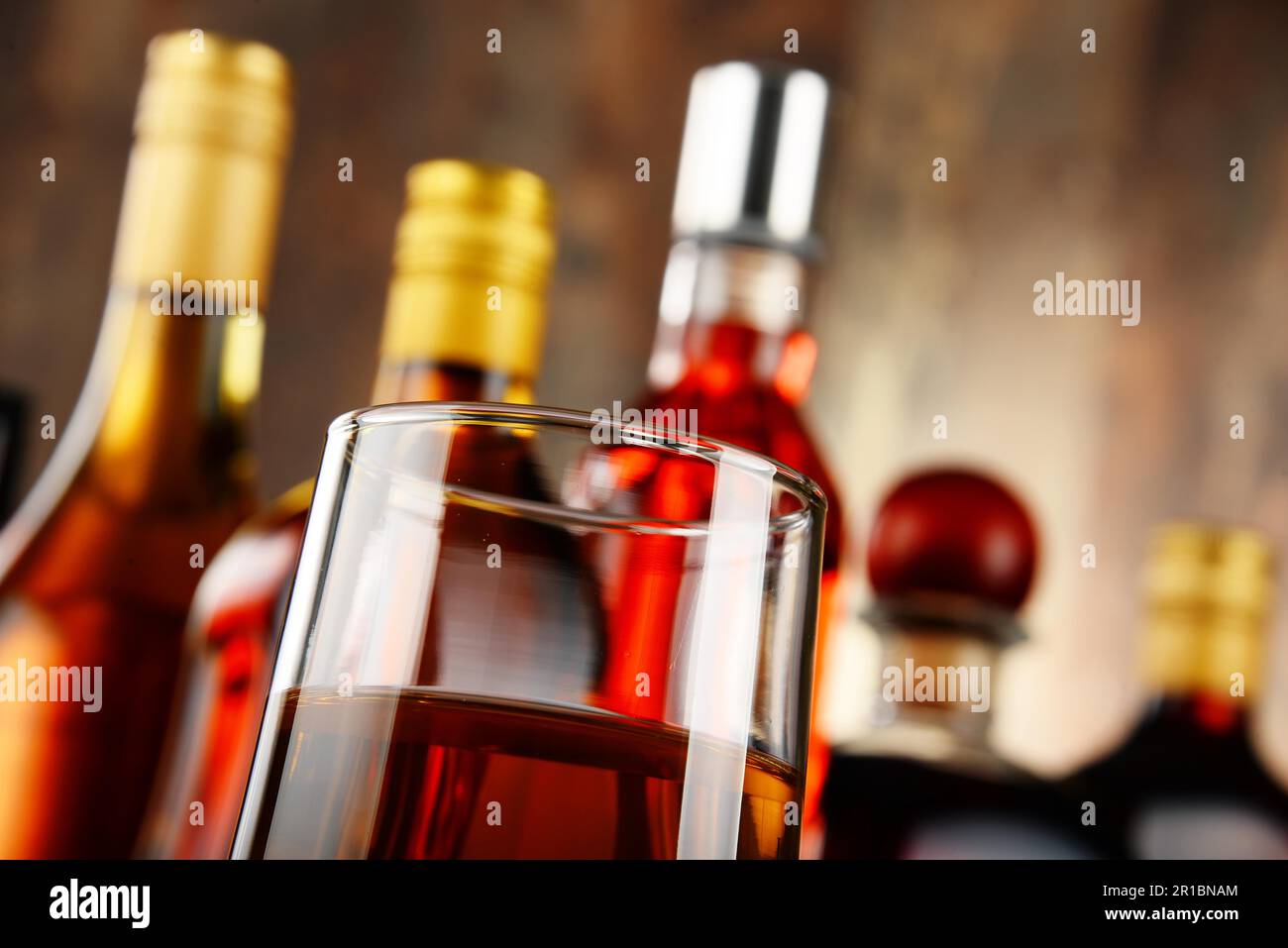 Bottles of assorted alcoholic beverages Stock Photo - Alamy