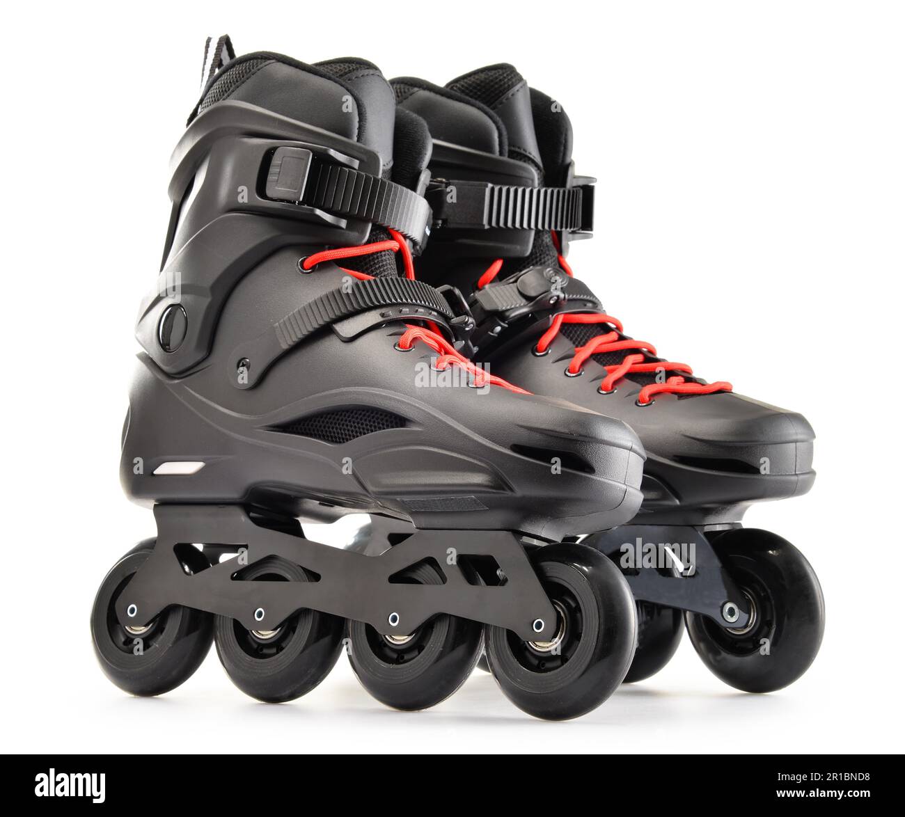 Pair of inline skates isolated on white background Stock Photo - Alamy