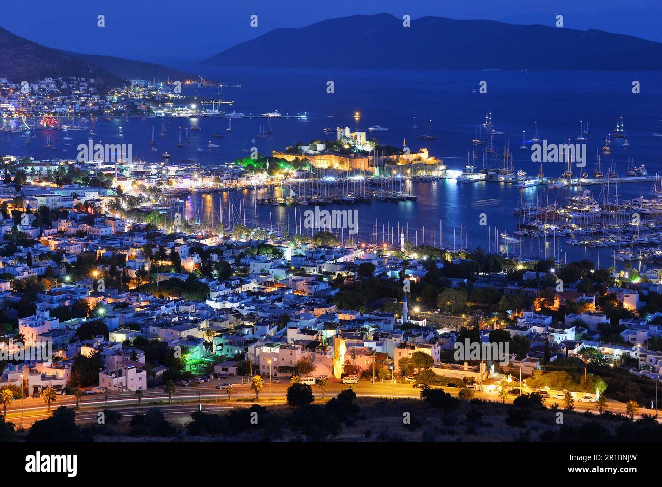 View of Bodrum harbor and Castle of St. Peter by night. Turkish Riviera ...