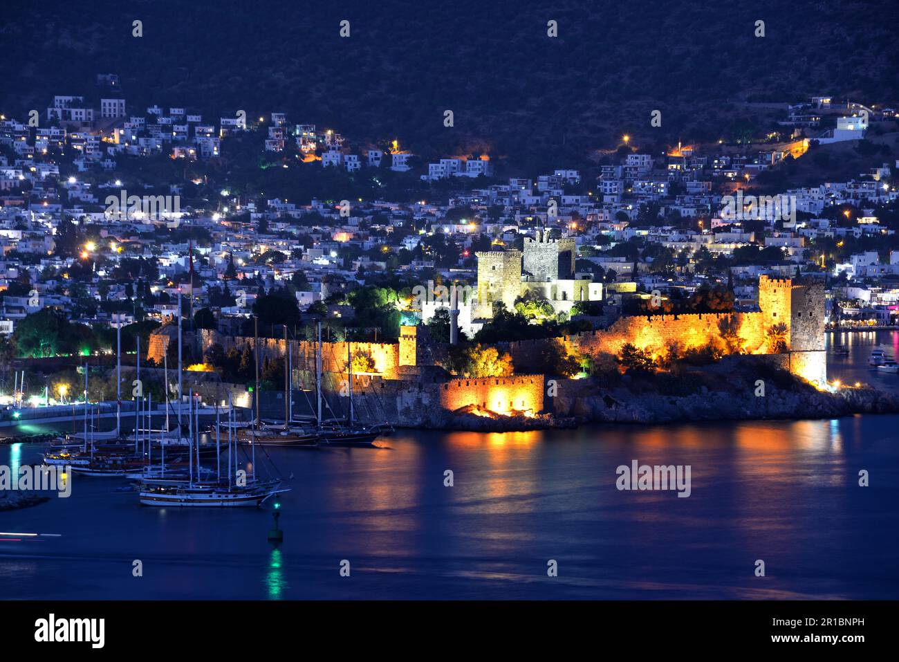 View of Bodrum harbor and Castle of St. Peter by night. Turkish Riviera ...